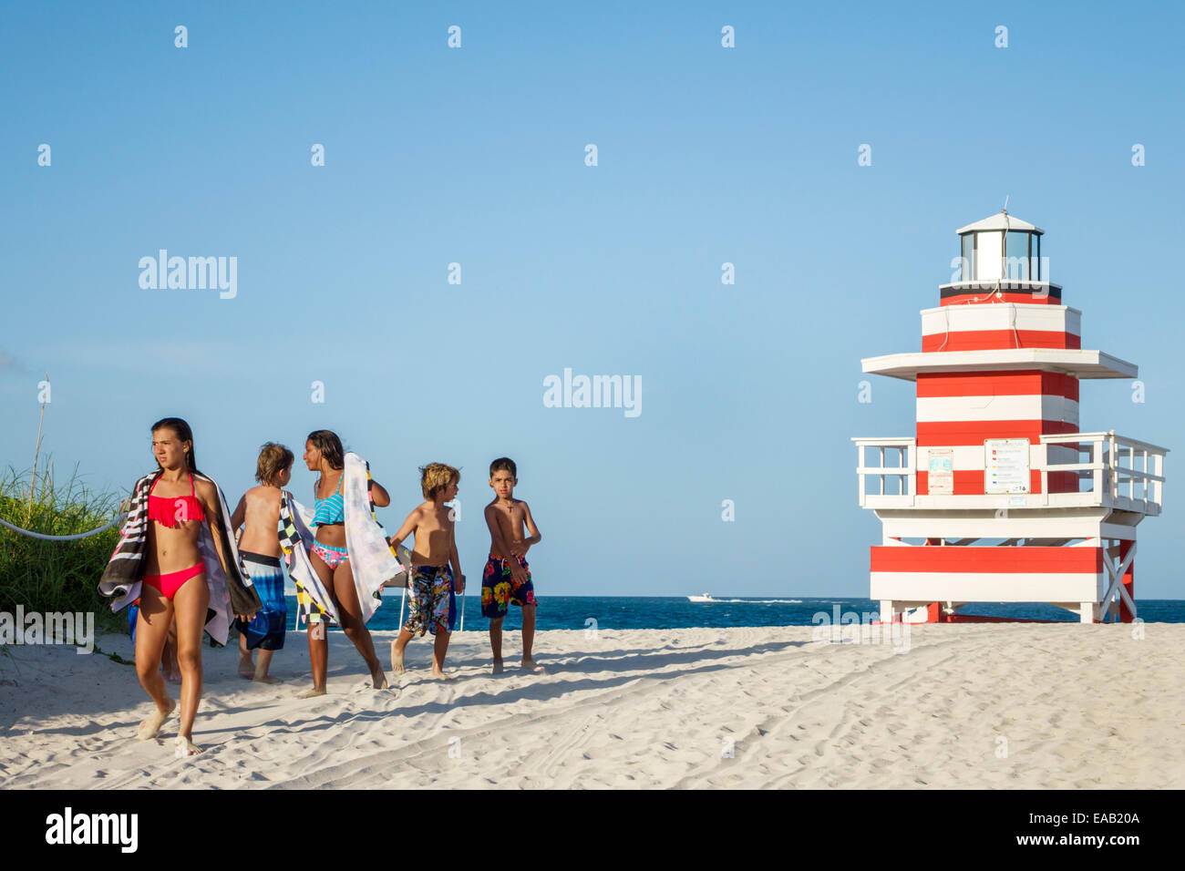 Miami Beach Florida,sand,lighthouse shaped lifeguard station,Hispanic ...