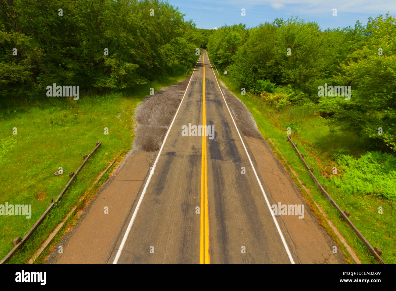 General view of a paved road .in the countryside Stock Photo - Alamy