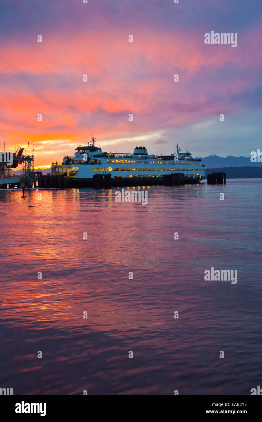 Ferry on the Puget Sound at sunset docking at Edmonds, Washington, USA ...