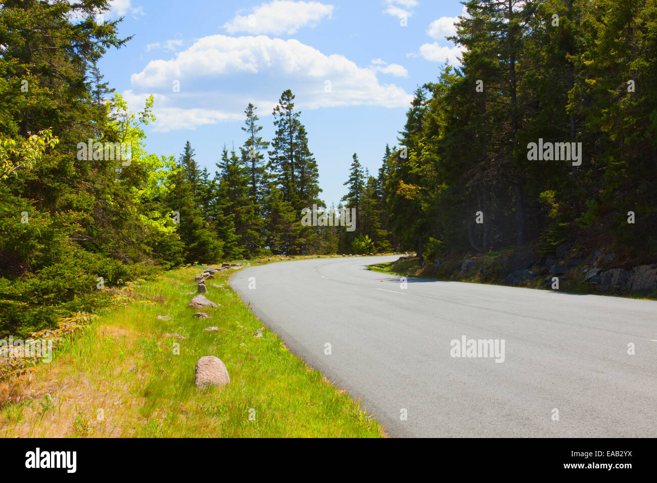 General view of a paved road .in the countryside Stock Photo - Alamy