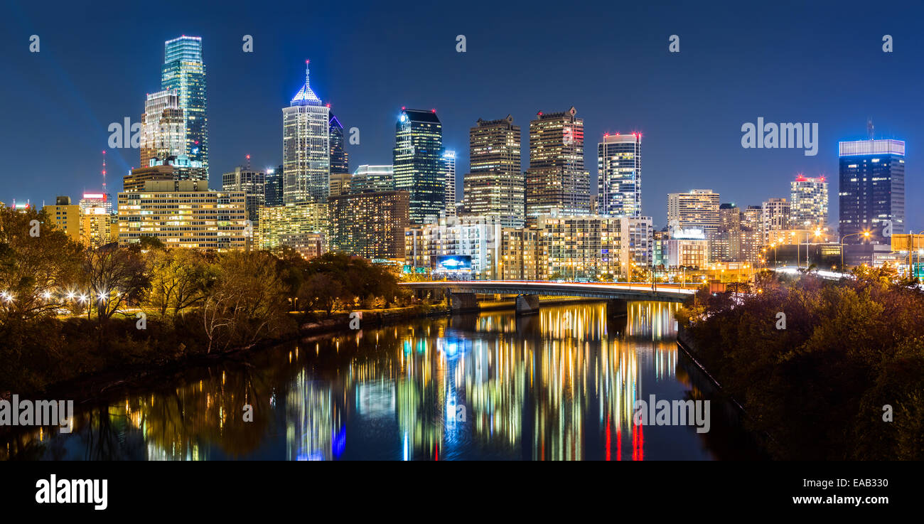 Philadelphia cityscape panorama by night. Schuylkill river reflects the ...