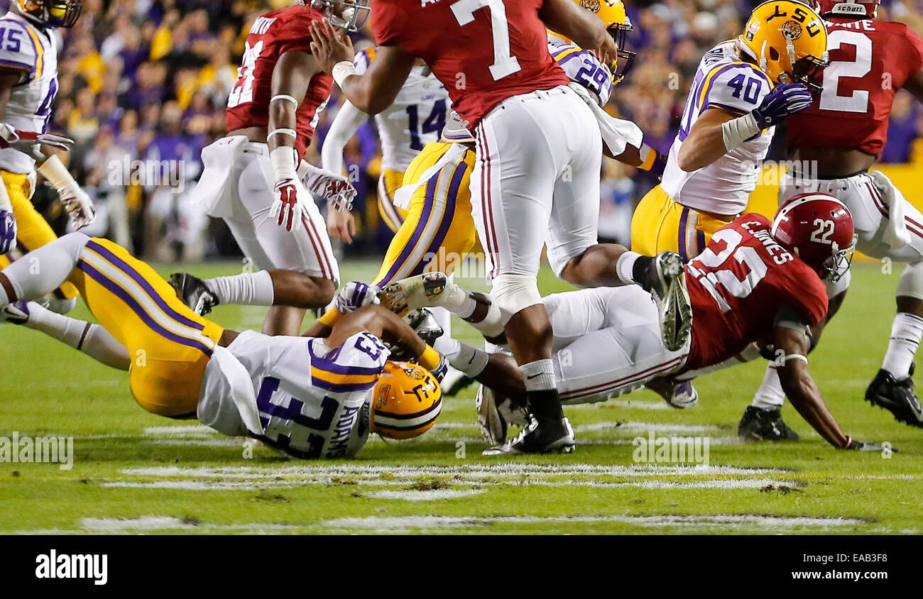 Alabama Crimson Tide wide receiver Christion Jones (22) is tripped up ...