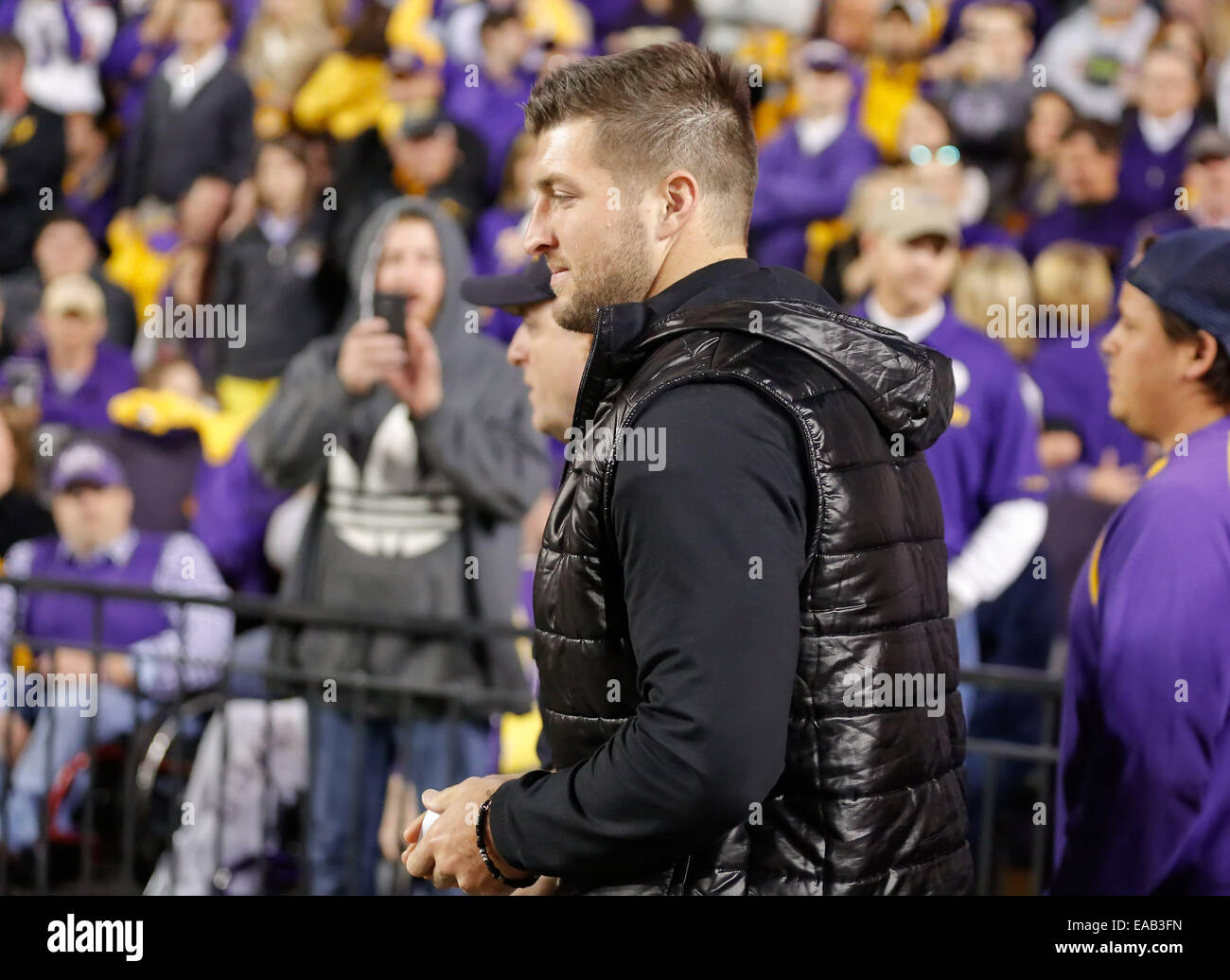 SEC Networks Tim Tebow walking the sidelines during the game between ...