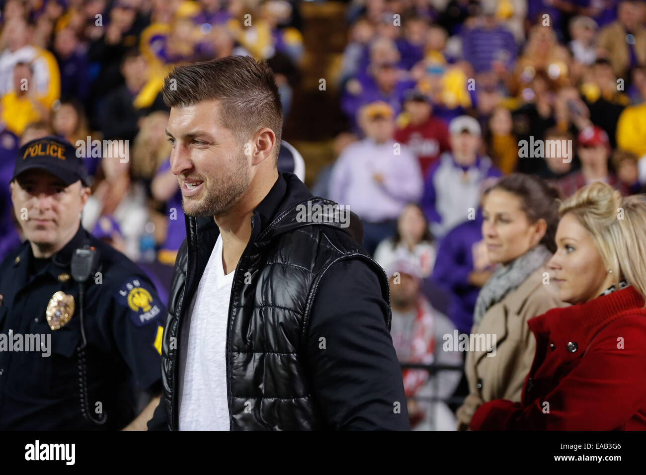 SEC Networks Tim Tebow walking the sidelines during the game between ...