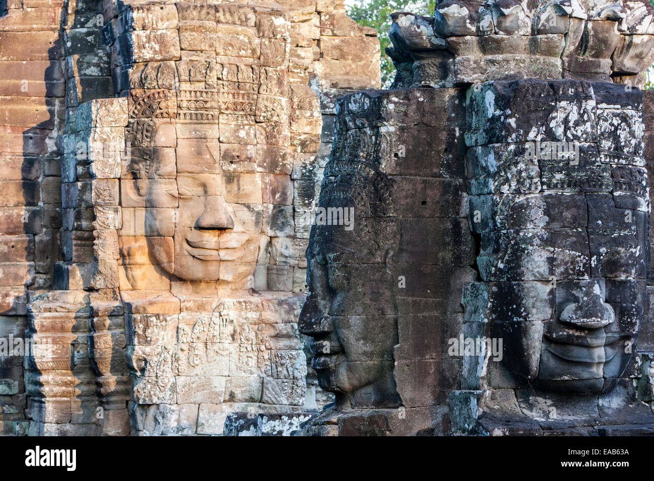 Cambodia, Bayon Temple. Three Smiling Buddha Faces Stock Photo - Alamy