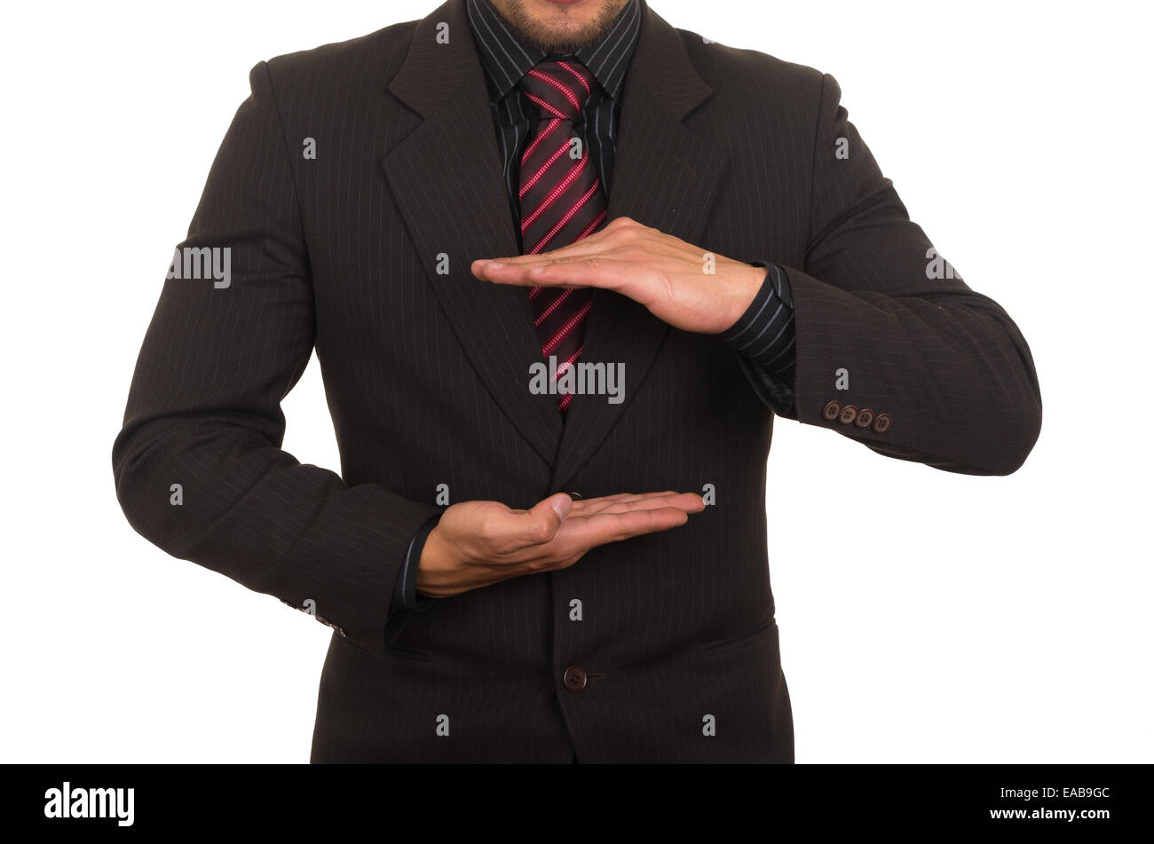 young businessman holding empty space Stock Photo - Alamy