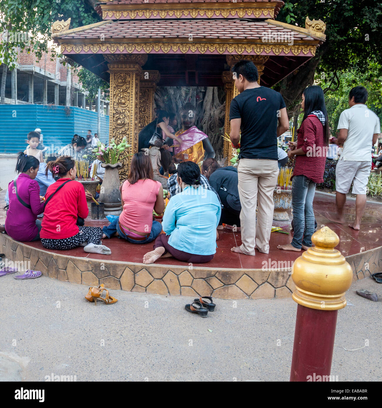Cambodia, Siem Reap. Worshipers at Shrine to Ya Tep, a Spirit (Neak-Ta ...