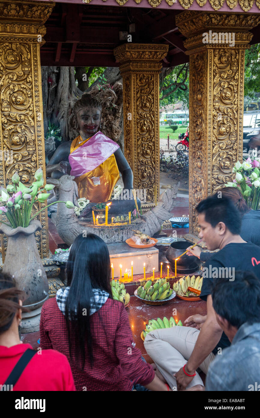 Animism neak ta offering shrine spirit spirit worship temple worshiper ...