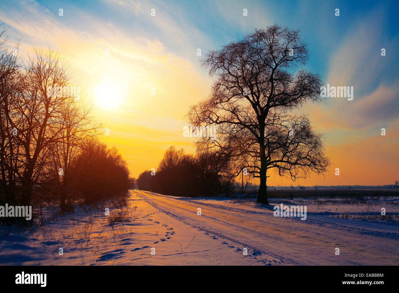 Tracks road snow sunrise hi-res stock photography and images - Alamy
