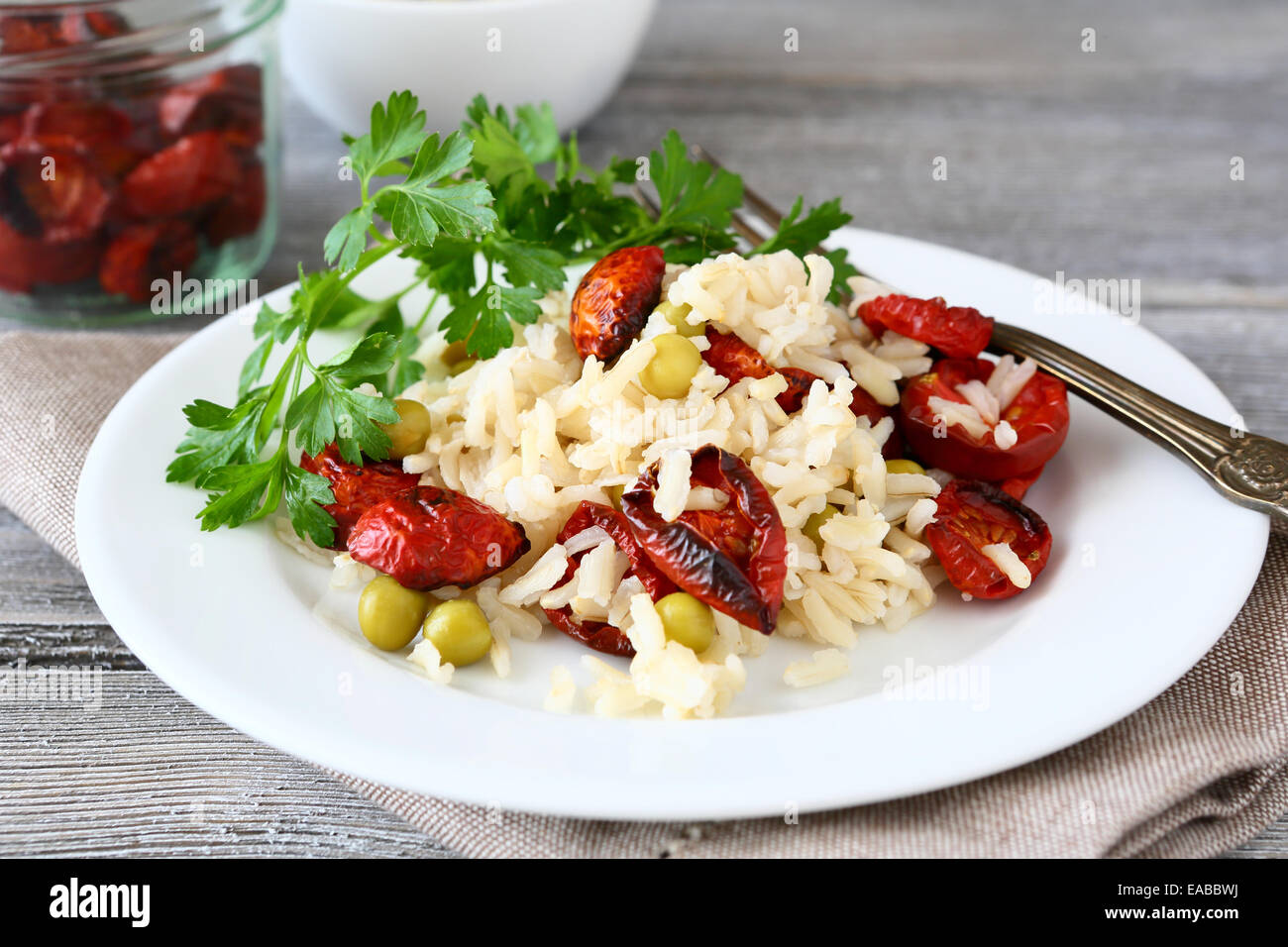 Italian risotto with vegetables, wooden background Stock Photo - Alamy