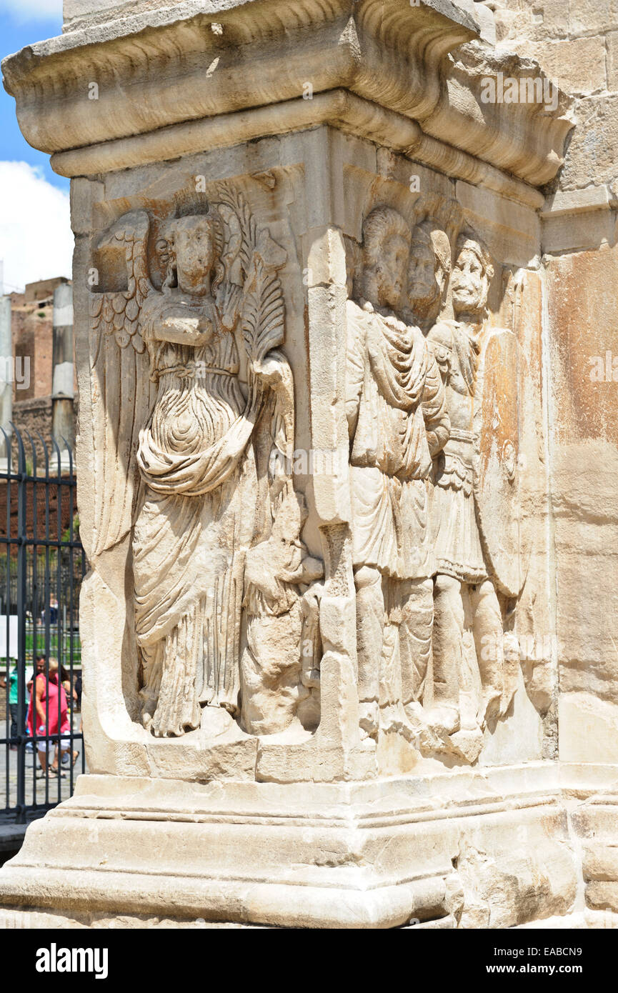Stone carvings of figures on the wall of the Arch of Constantine, Rome ...