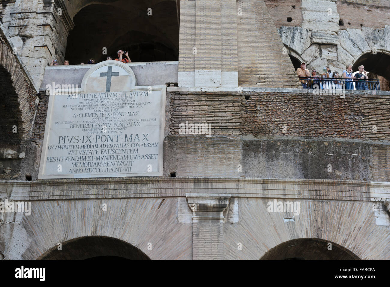 A religious plaque on the exterior wall of the Iconic Colosseum in the ...