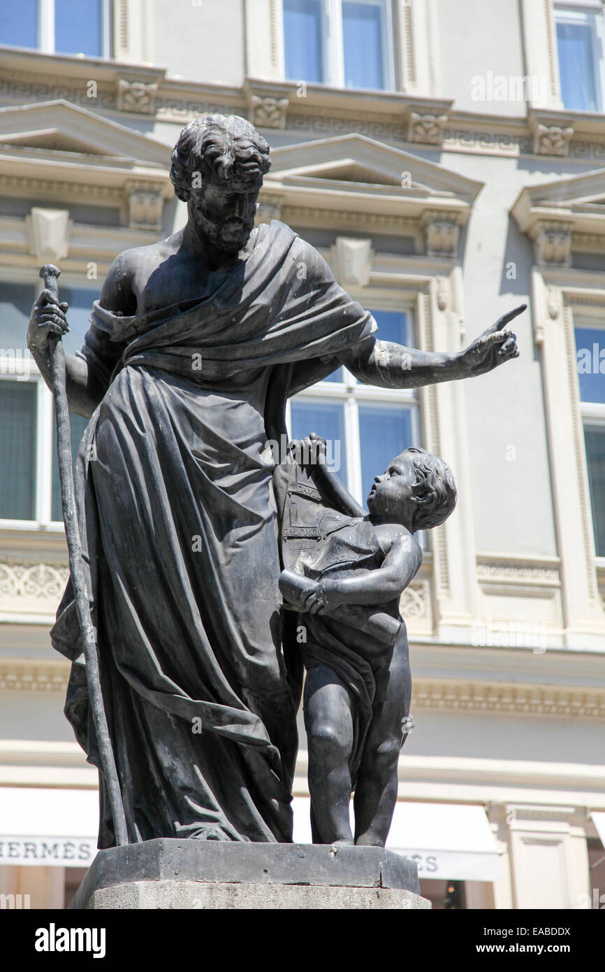 Bronze statue of a man and young boy. Vienna, Austria Stock Photo - Alamy