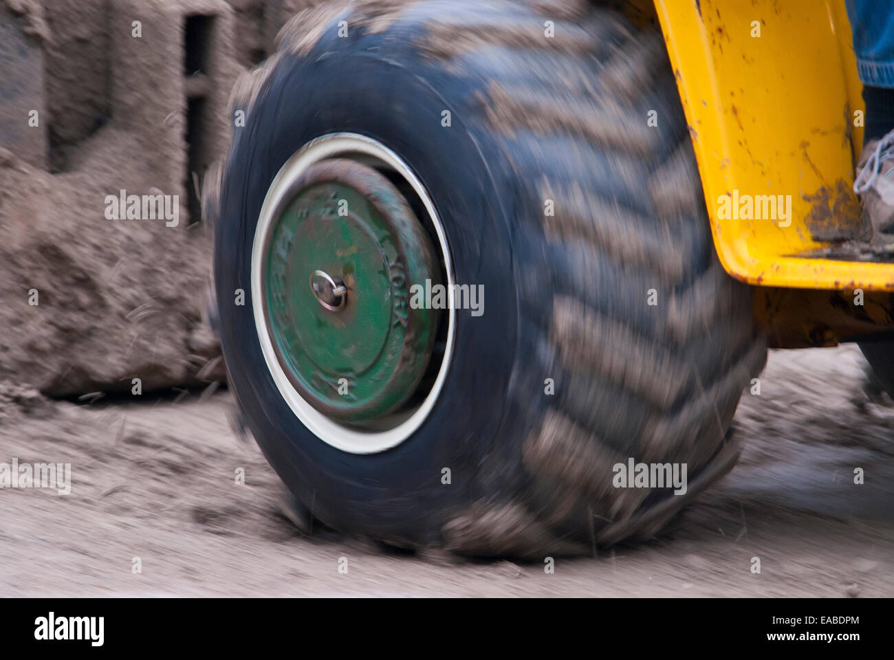 Tractor pull tire in blurred motion Stock Photo - Alamy