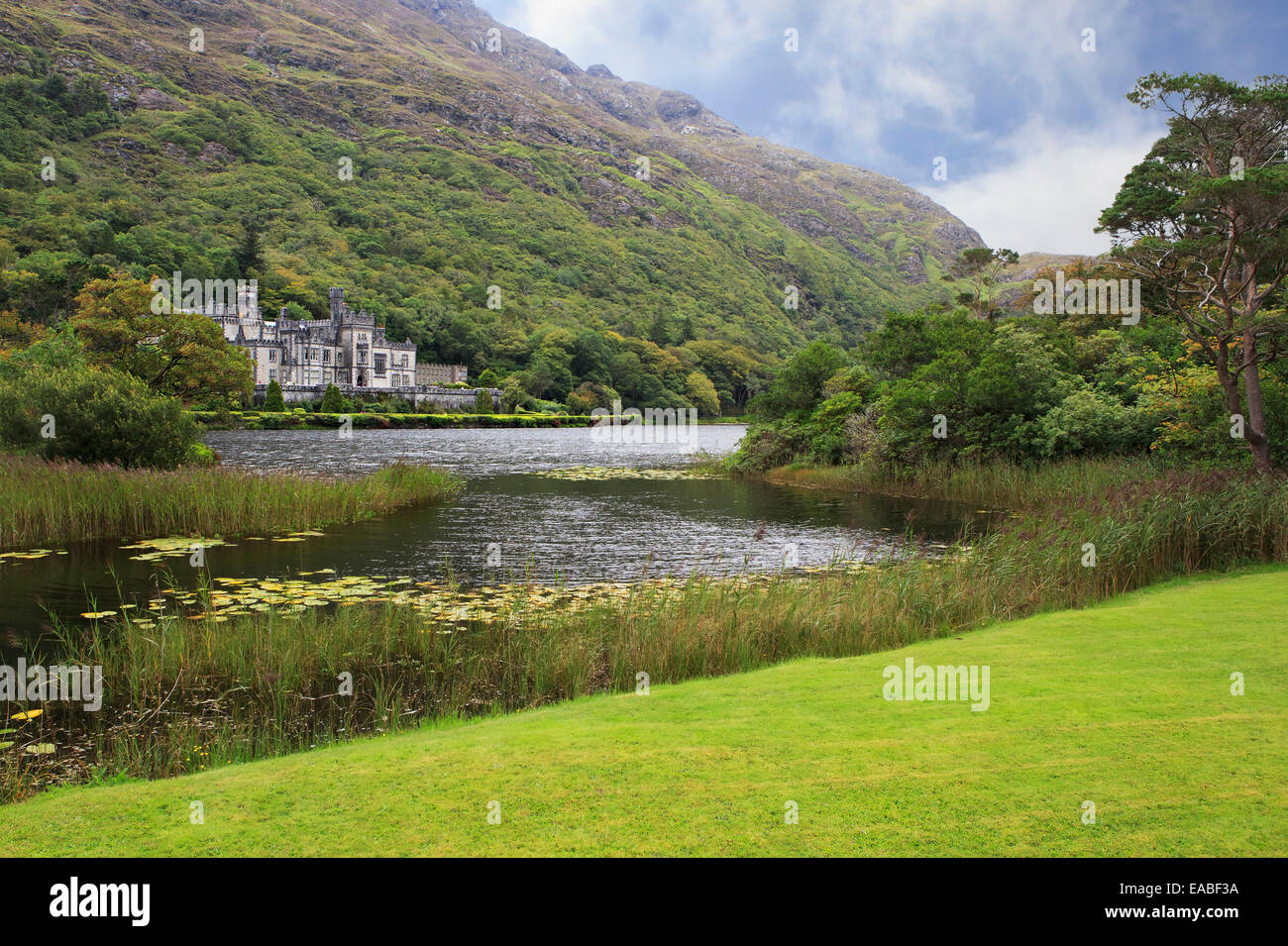 Kylemore Abbey in mountains on the lake Stock Photo - Alamy