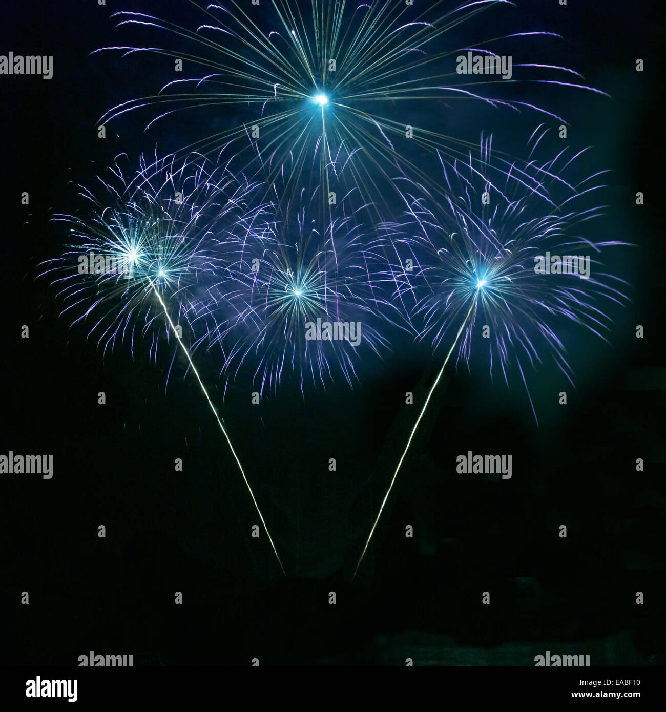Blue fireworks on the black sky background Stock Photo - Alamy
