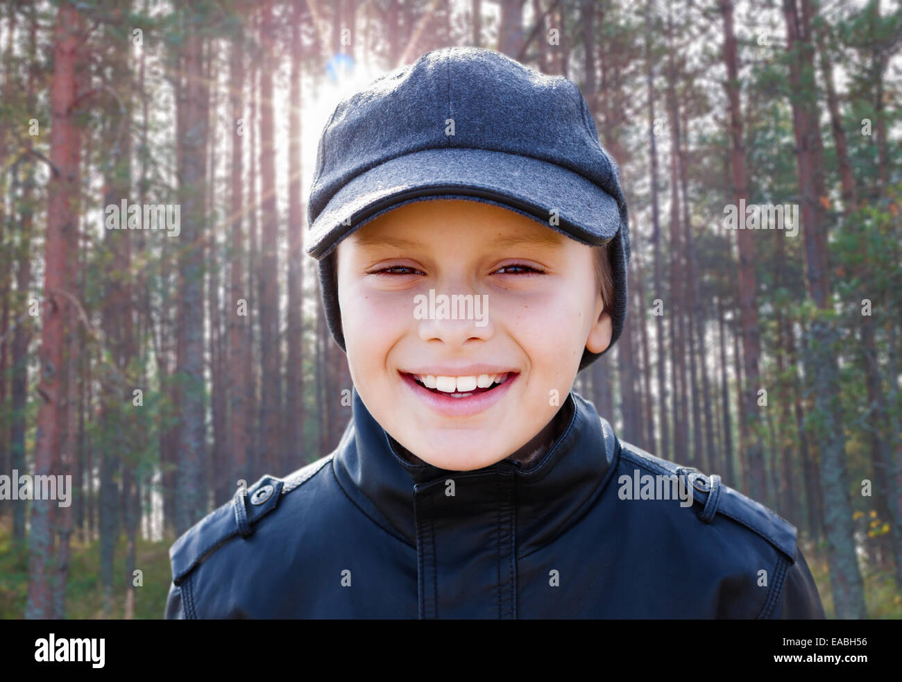 child boy happy smile back light portrait sunshine forest background ...