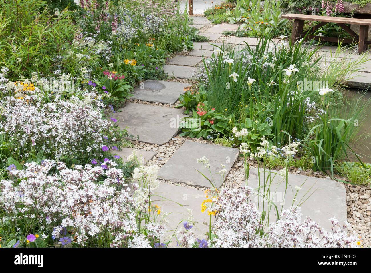 paved small garden with pond at chelsea flower show Stock Photo - Alamy