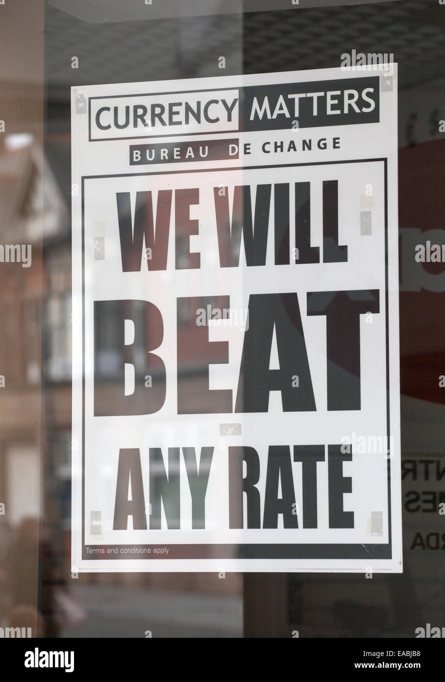 Currency exchange shop with adverts offering the days deals and ...