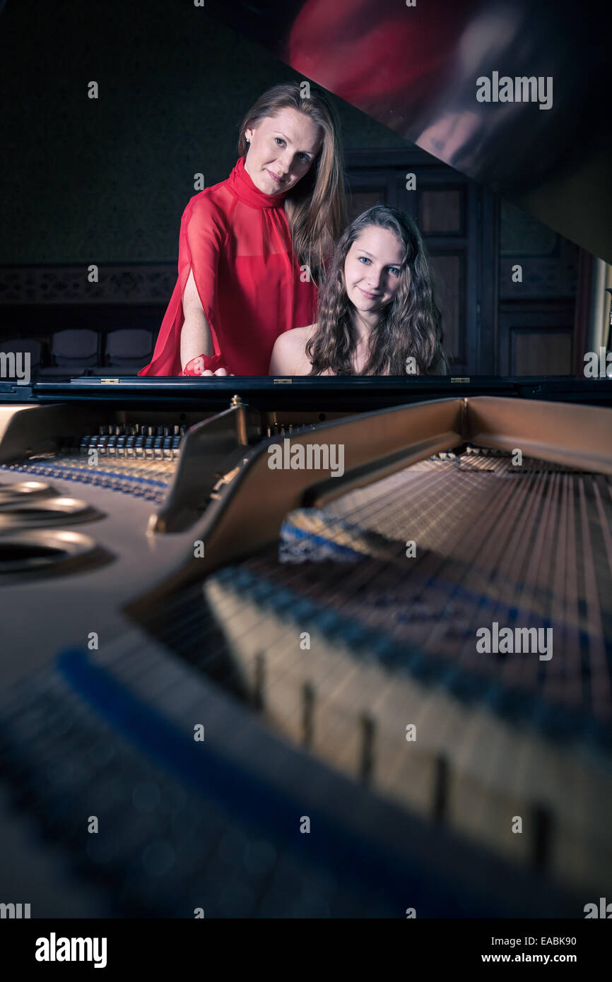 indoor portrait of a young female piano player Stock Photo - Alamy