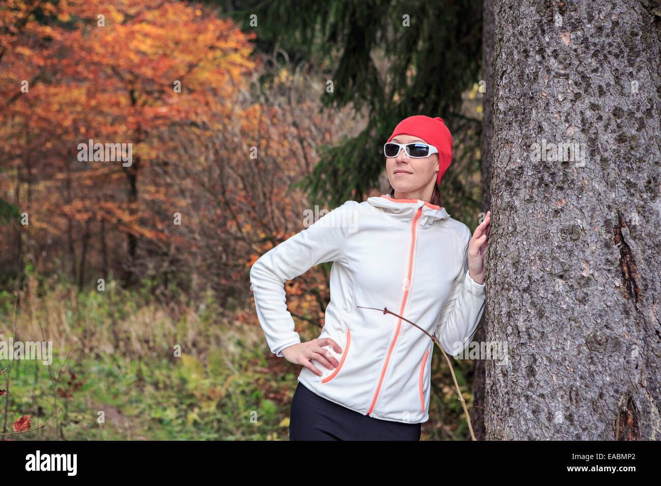 woman running through the forest by the lake Stock Photo - Alamy