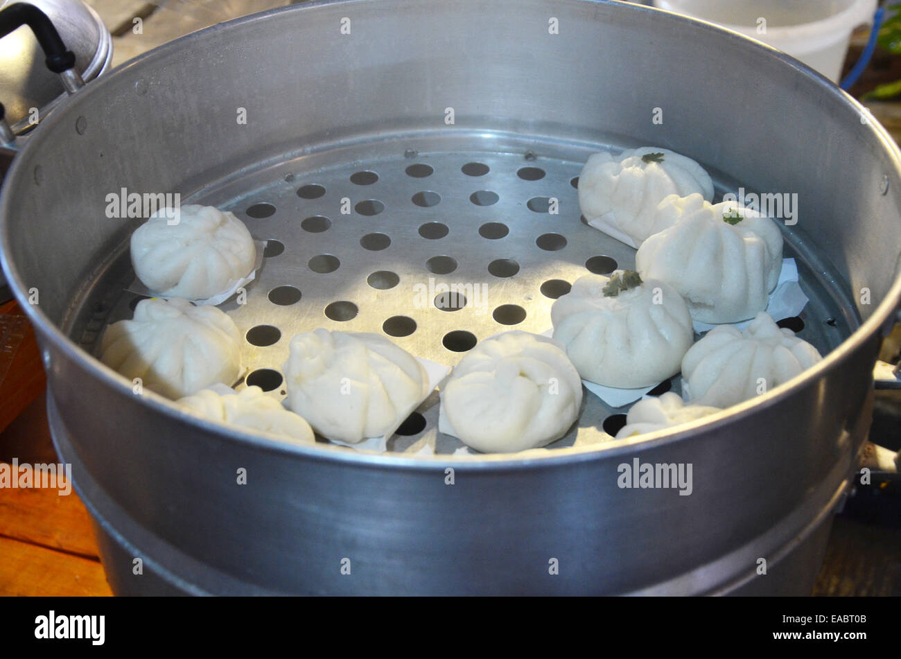 Steamed stuff bun in Pot steaming pressure Stock Photo - Alamy