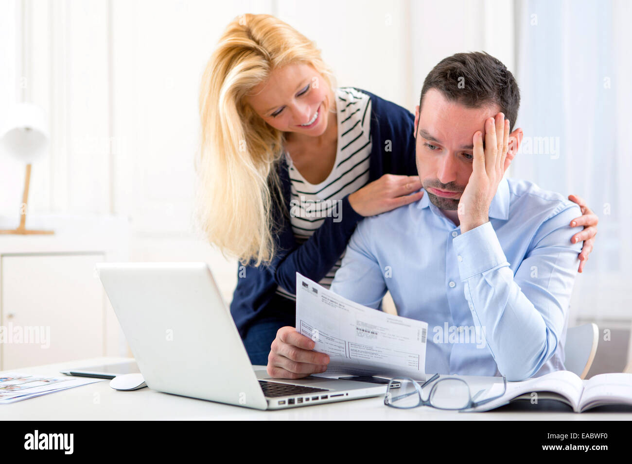 Couple doing taxes hi-res stock photography and images - Alamy