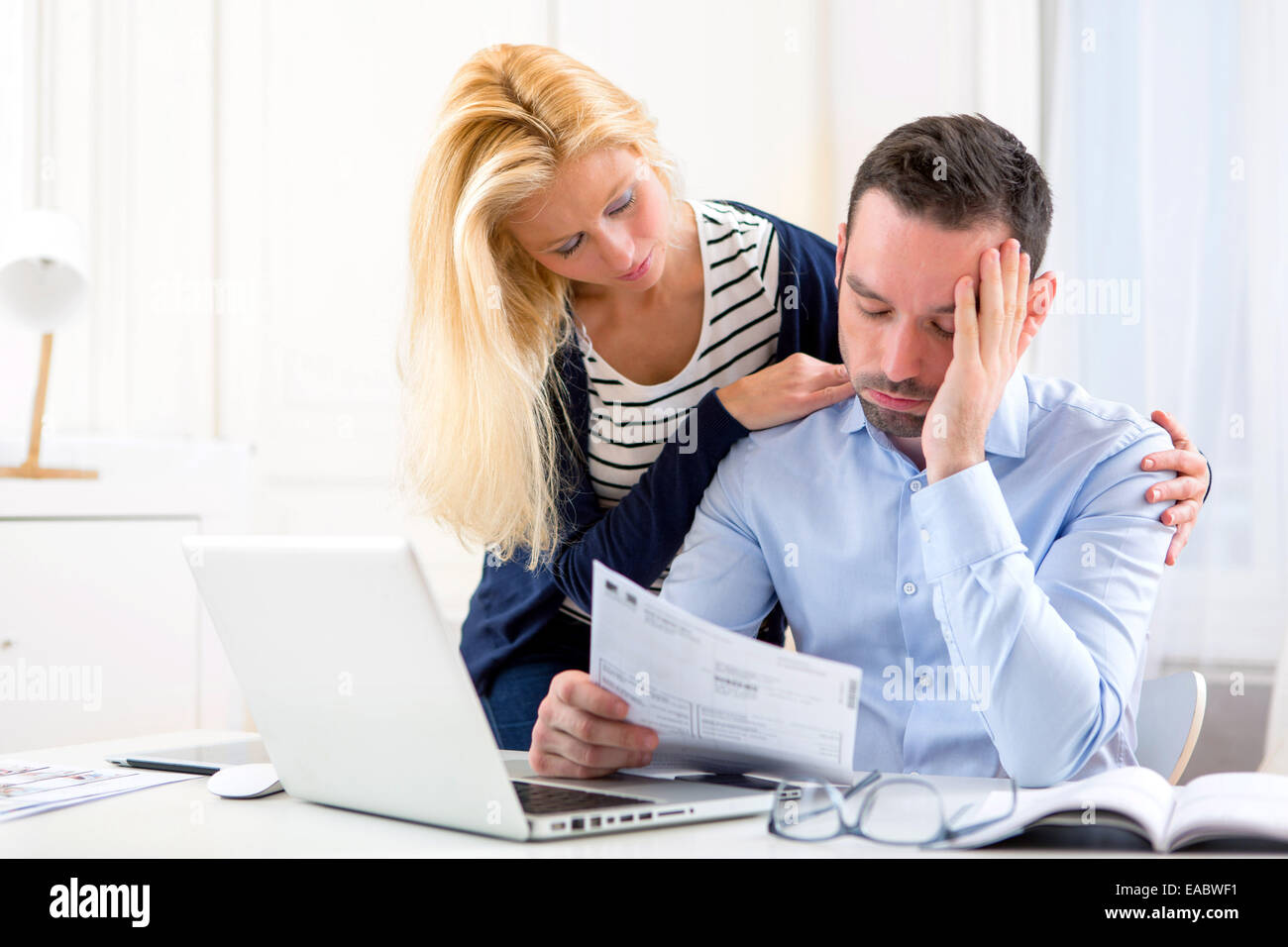 View of an Attractive couple doing administrative paperwork Stock Photo ...