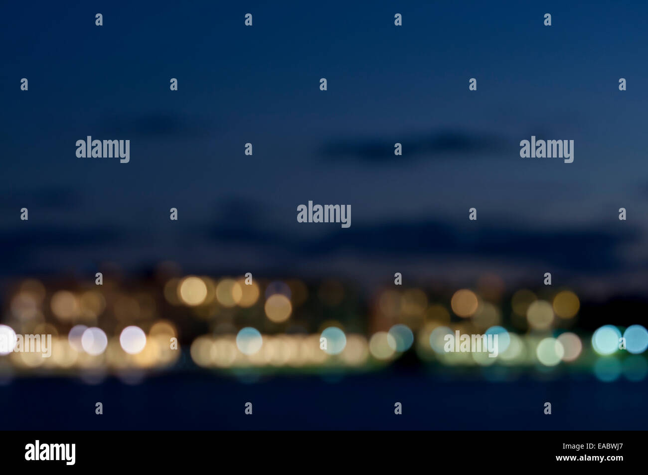 A night skyline blurred out of focus to give a nice bokeh on lights ...