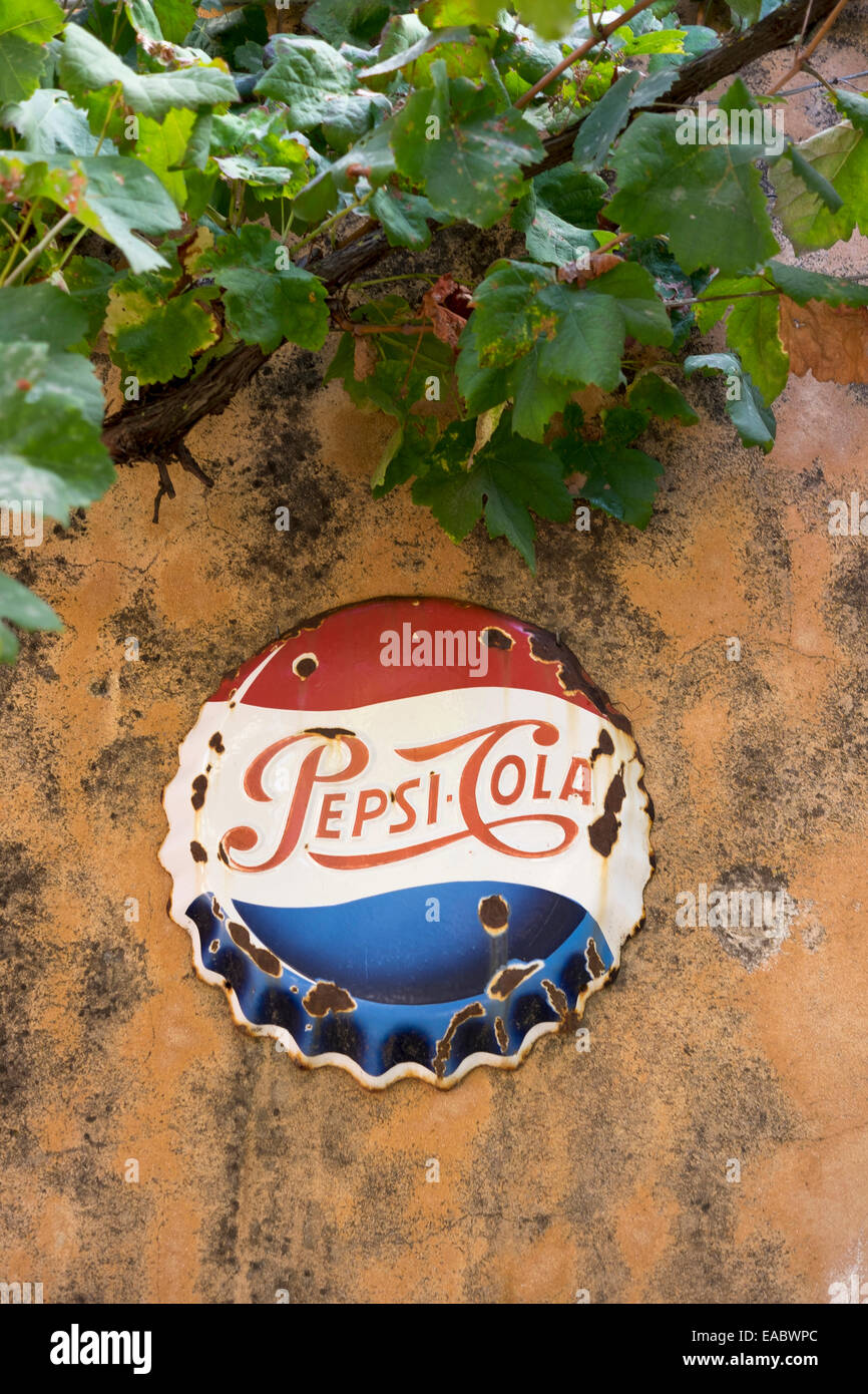 Spain Balearic Islands Mallorca Arta grape vine and commercial sign for ...