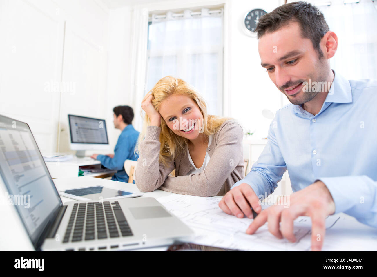 View of a Group of co workers at the office Stock Photo - Alamy