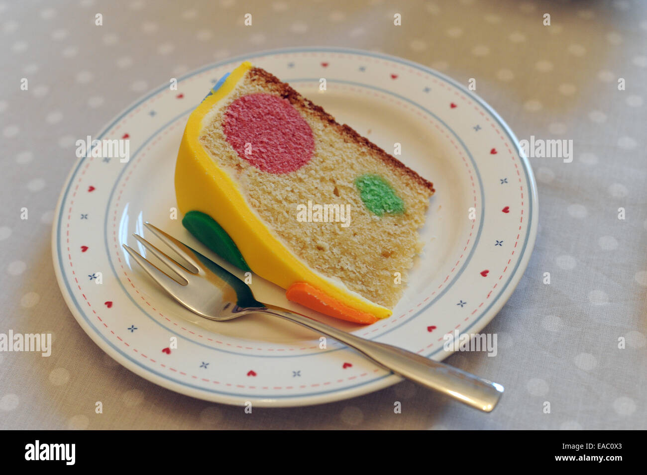 Slice of Spotty Cake on plate Stock Photo - Alamy