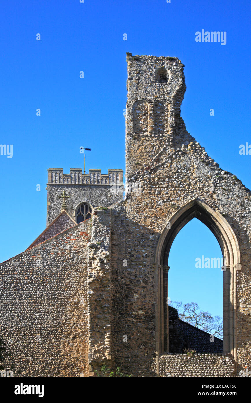 A view of the ruined Saxon tower in the Priory remains at Weybourne ...