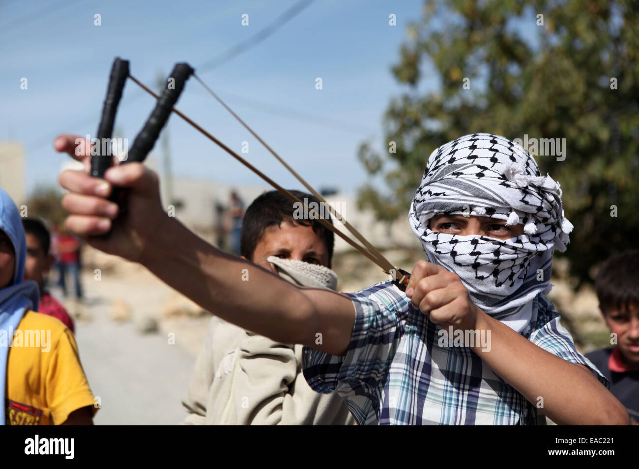 Palestinian with sling shot hi-res stock photography and images - Alamy