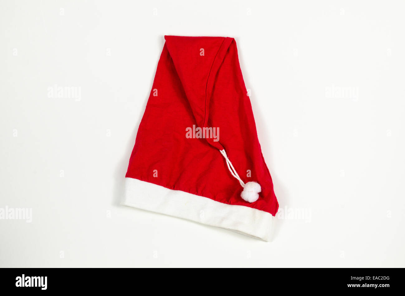 Santa Claus red and white cap at a white background Stock Photo - Alamy