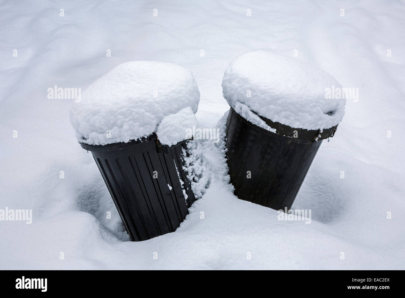 Dustbins covered with snow Stock Photo - Alamy