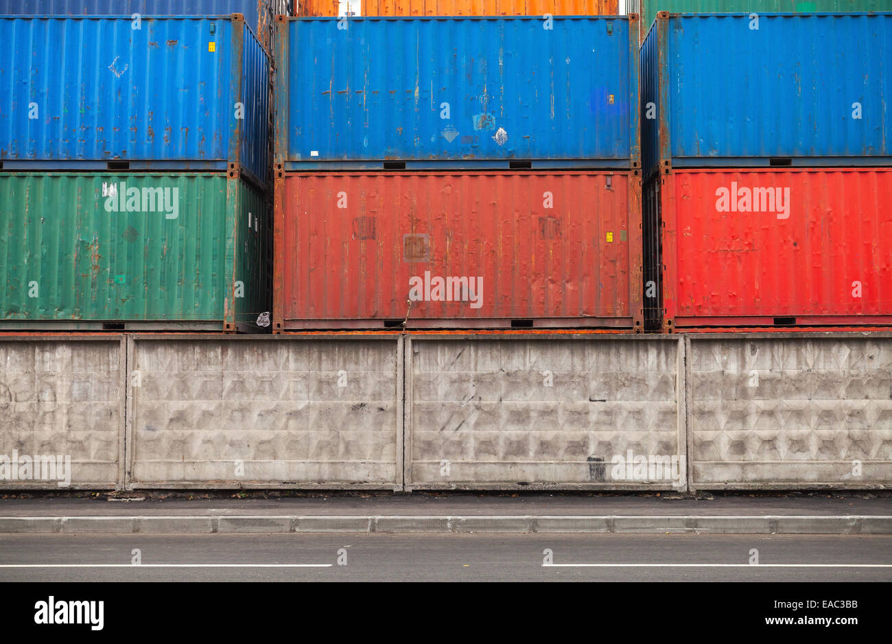 Industrial cargo containers are stacked in the port area Stock Photo ...
