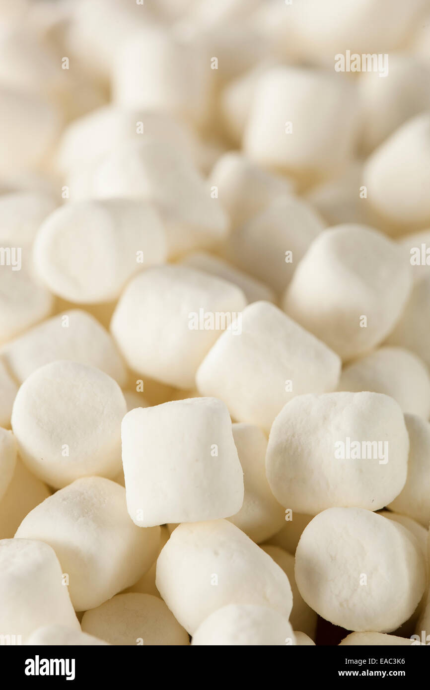 Unhealthy White Mini Marshmallows in a Bowl Stock Photo - Alamy