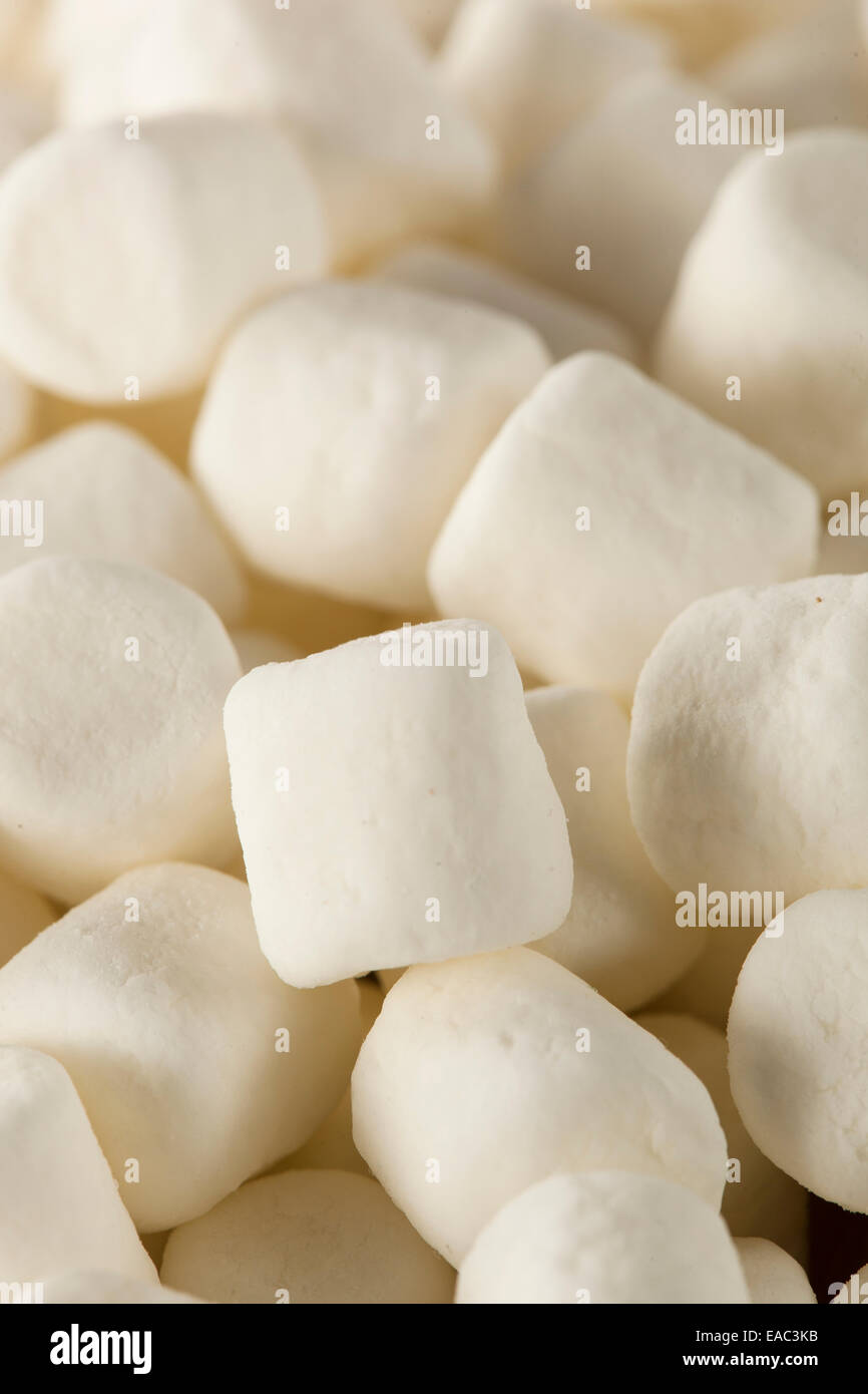 Unhealthy white mini marshmallows hi-res stock photography and images ...