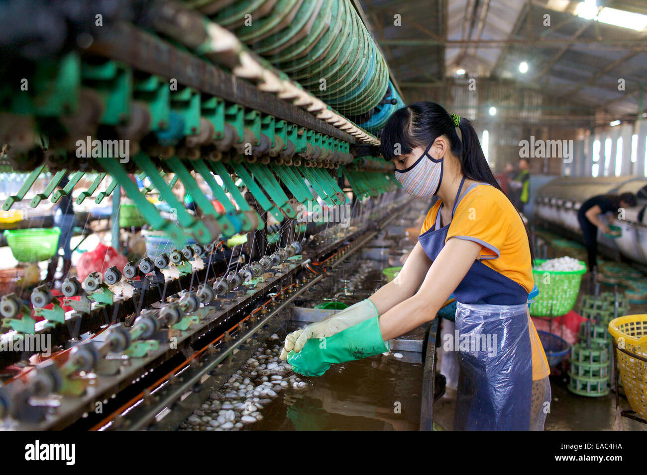 Woman working in silk factory in Vietnam Stock Photo - Alamy