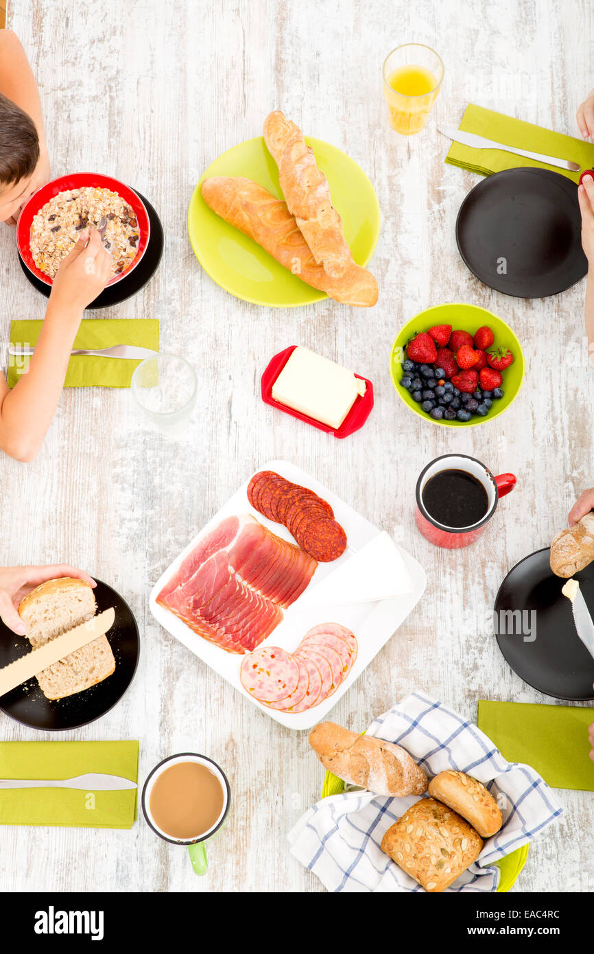 A family having breakfast at home seen from above Stock Photo - Alamy