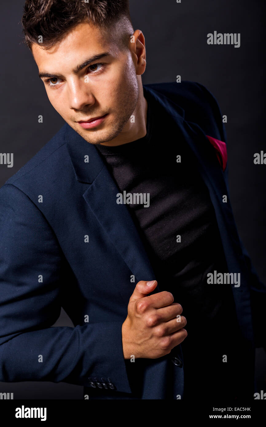 Young man in studio Stock Photo - Alamy