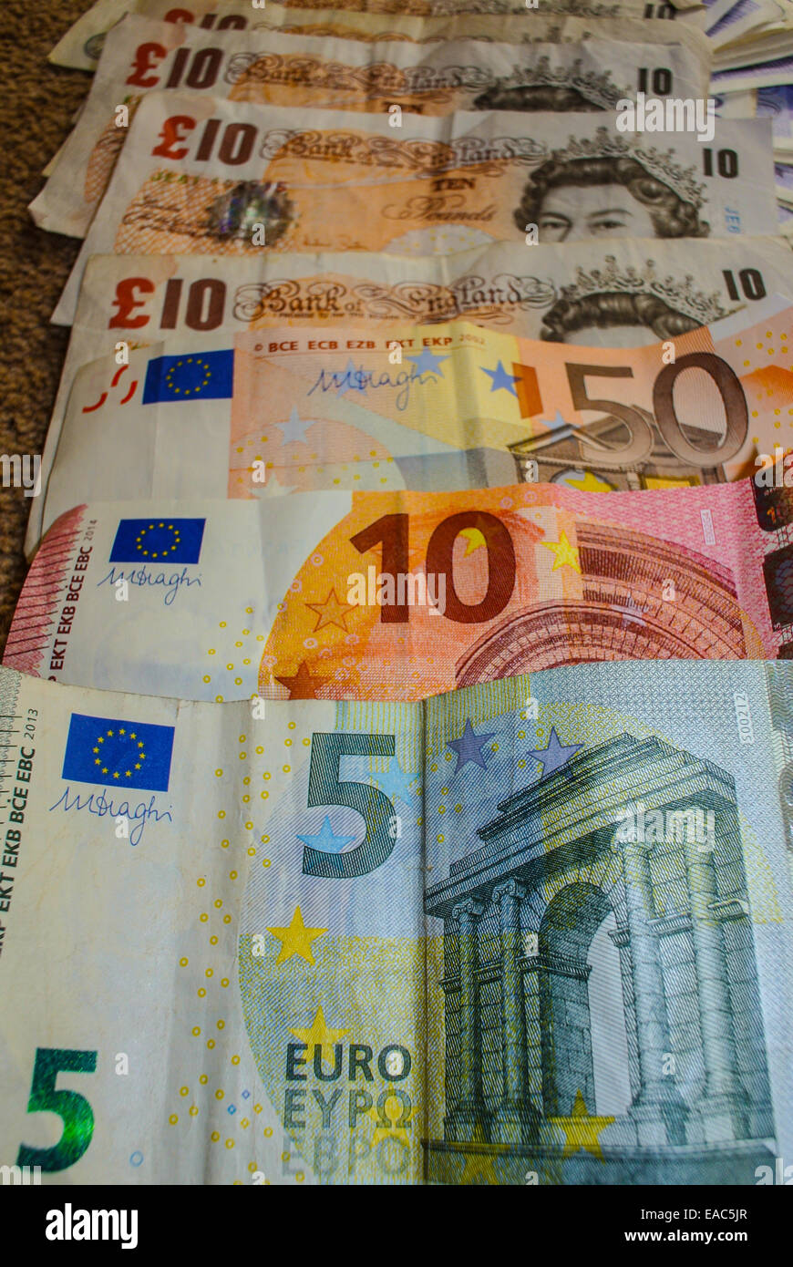 Pound notes euros cash and money Stock Photo - Alamy
