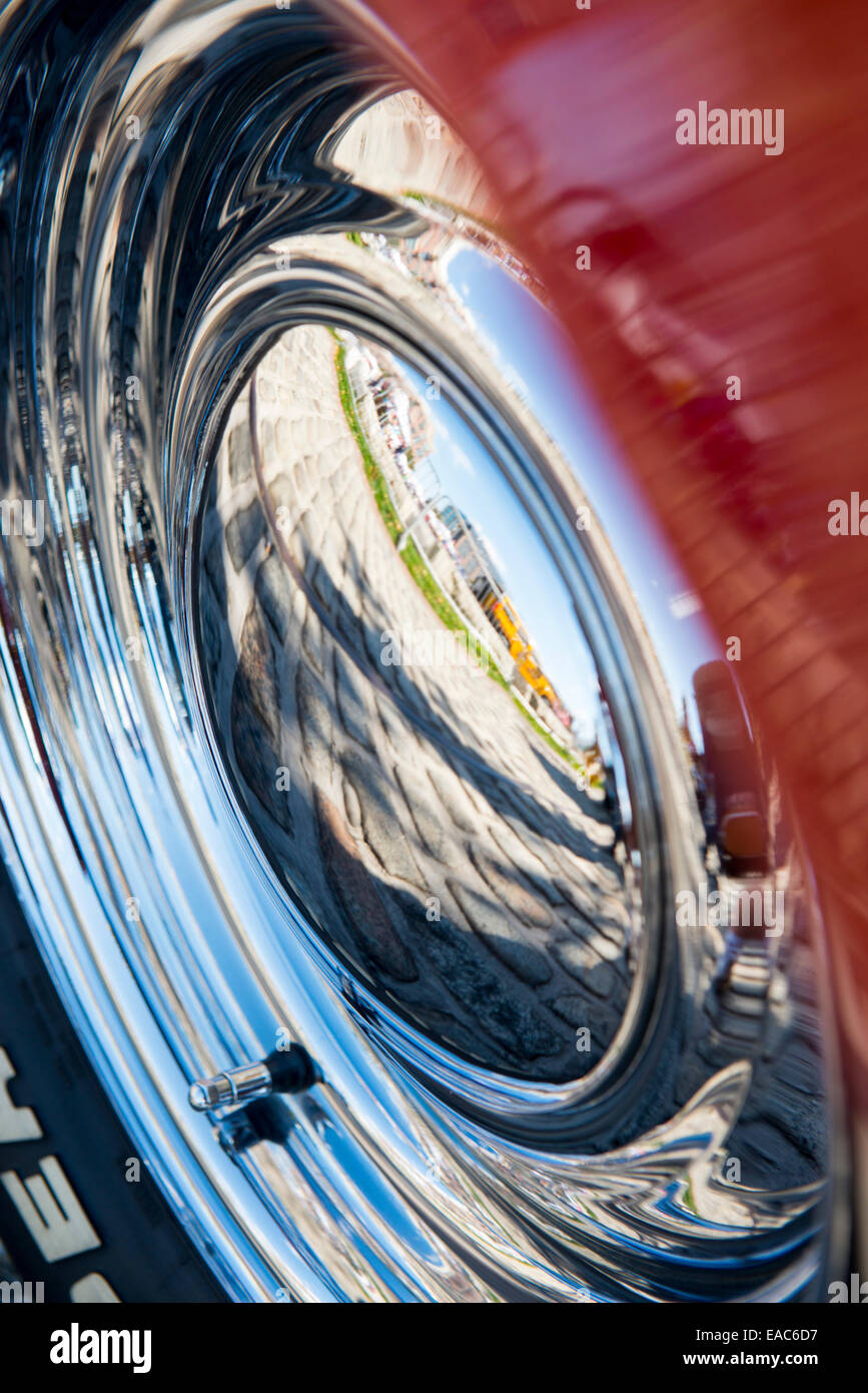 Reflection in the wheel of a classic car at the Fells Point Fun ...