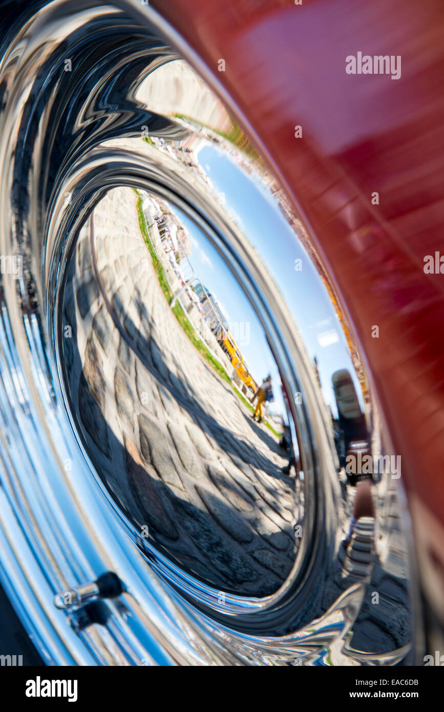 Reflection in the wheel of a classic car at the Fells Point Fun ...