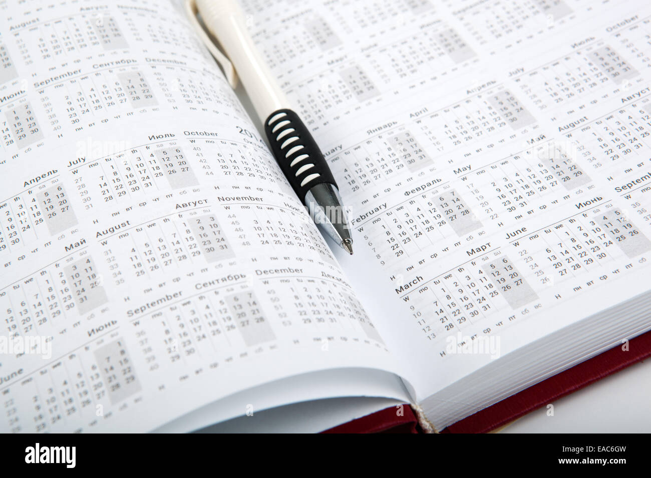 calendar days with numbers and pen close up Stock Photo - Alamy