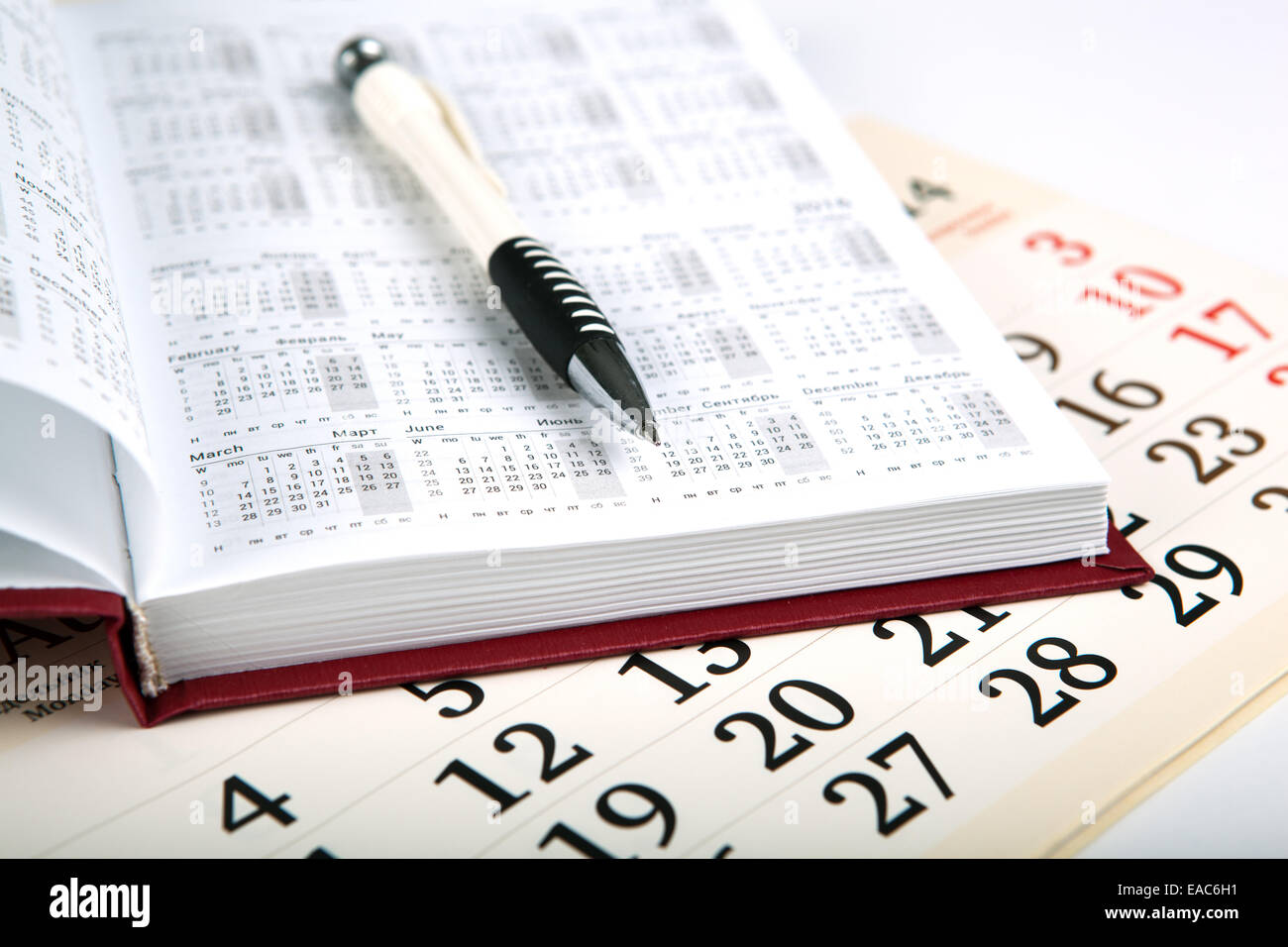 calendar days with numbers and pen close up Stock Photo - Alamy