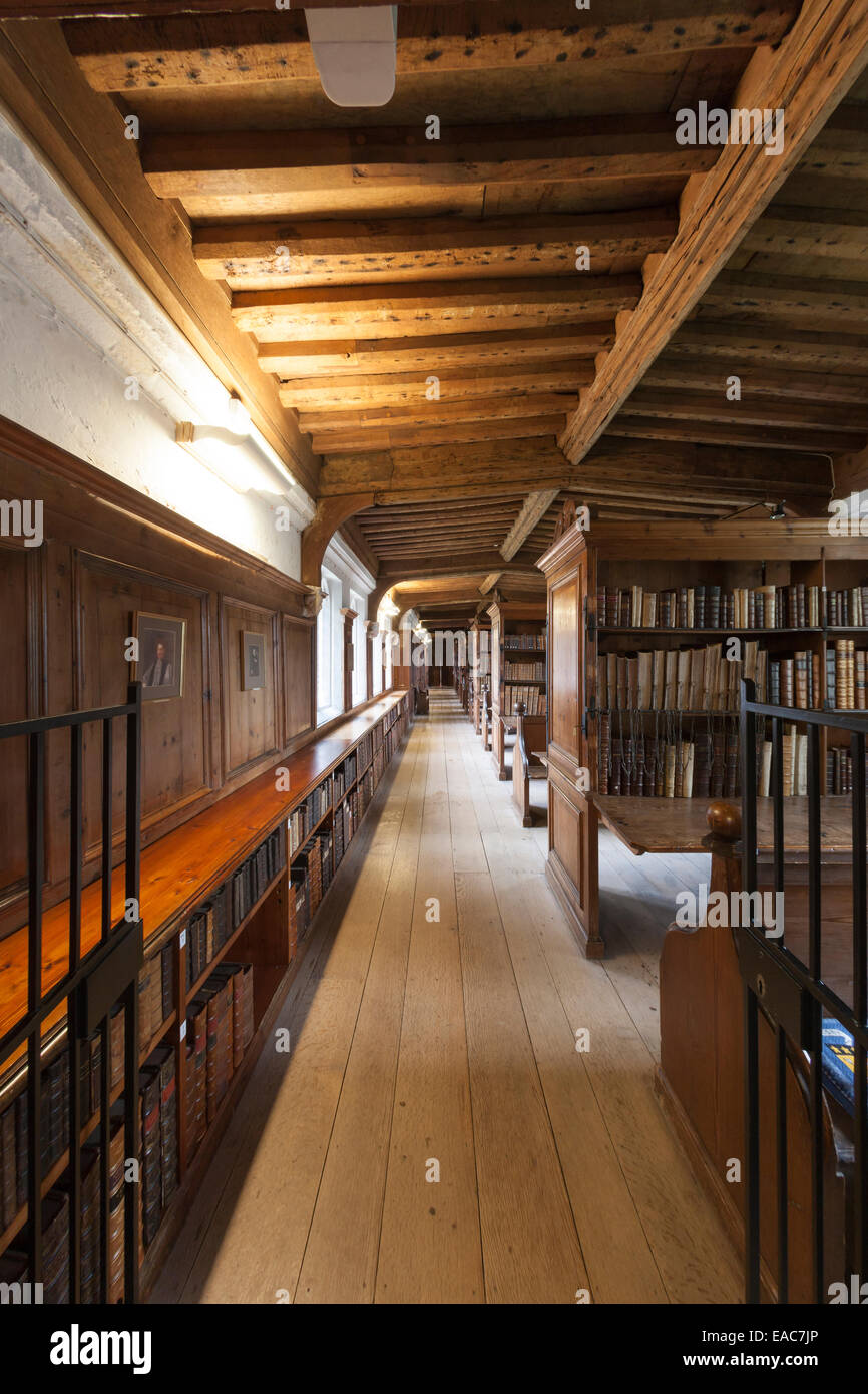 Leather bound books in the cathedral library, Wells Cathedral, Somerset ...