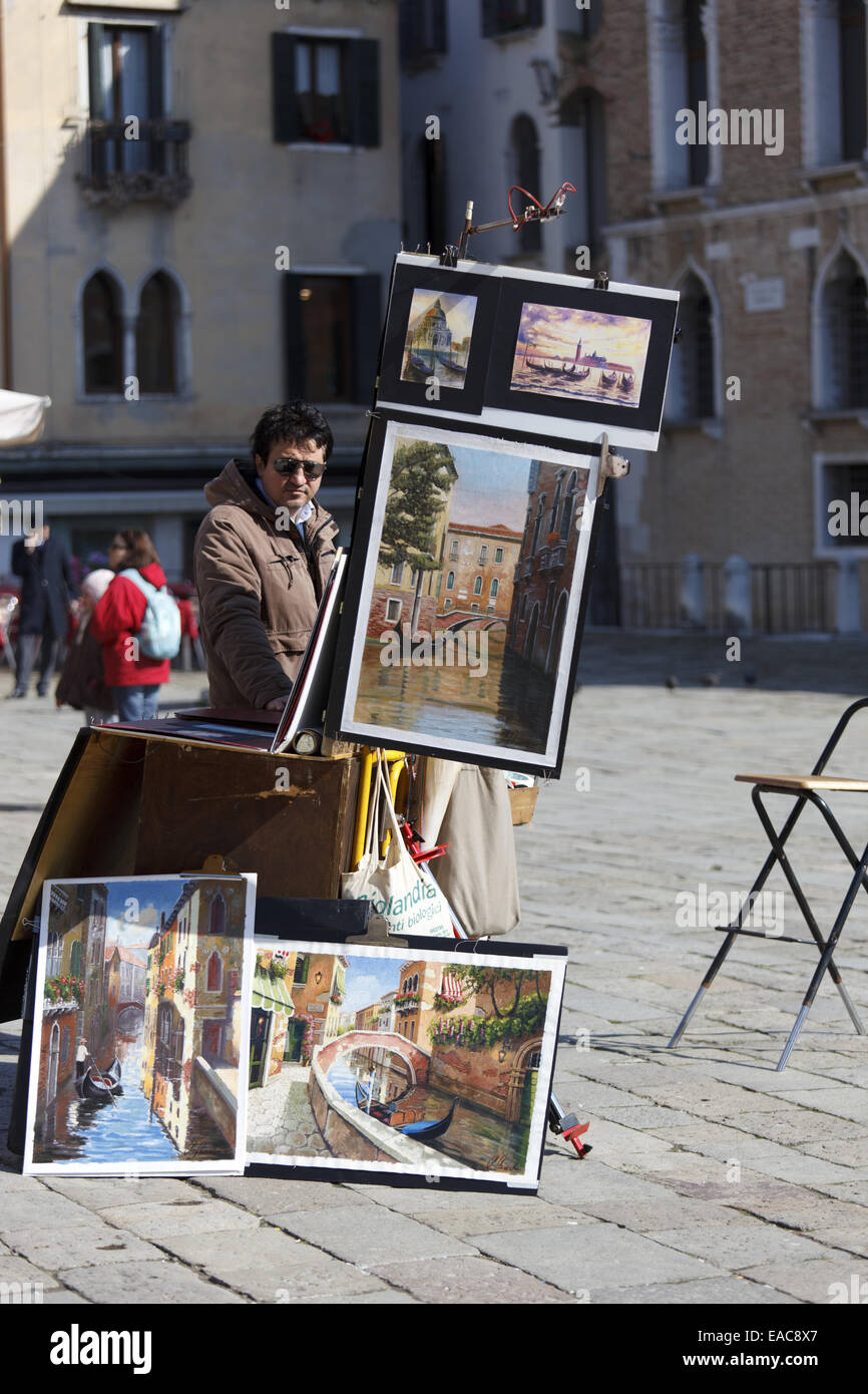 man selling paintings Stock Photo - Alamy