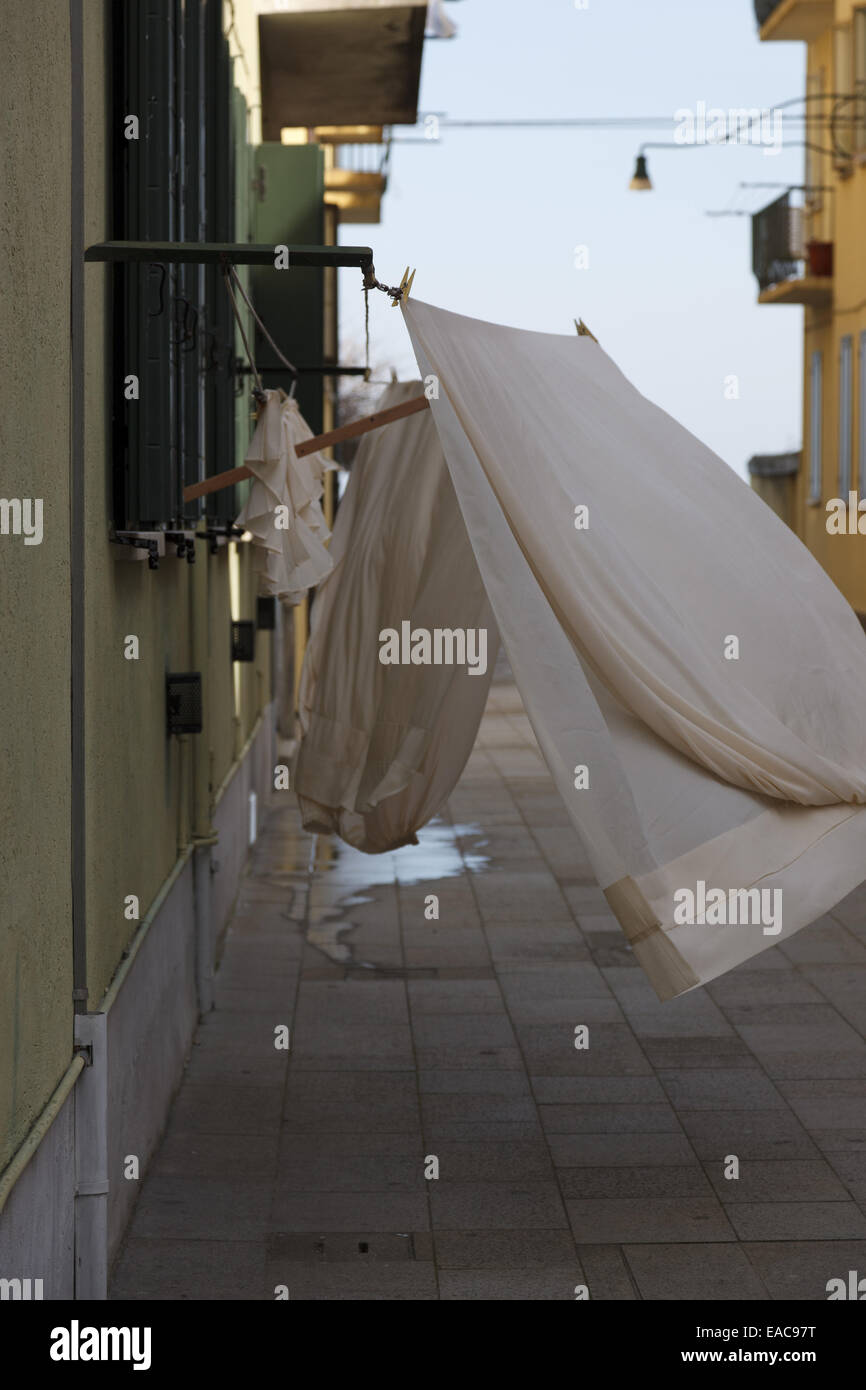 clothes on laundry line waving in the wind Stock Photo - Alamy
